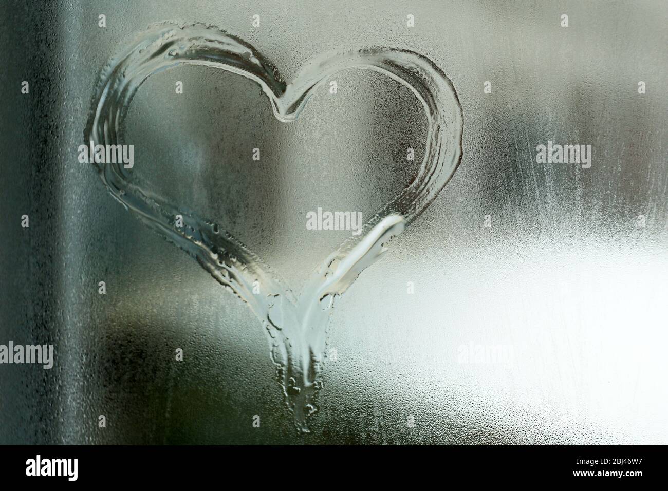 Heart drawn on the fogged glass window Stock Photo - Alamy
