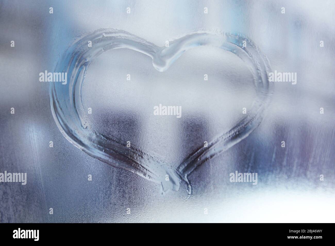 Heart drawn on the fogged glass window Stock Photo - Alamy