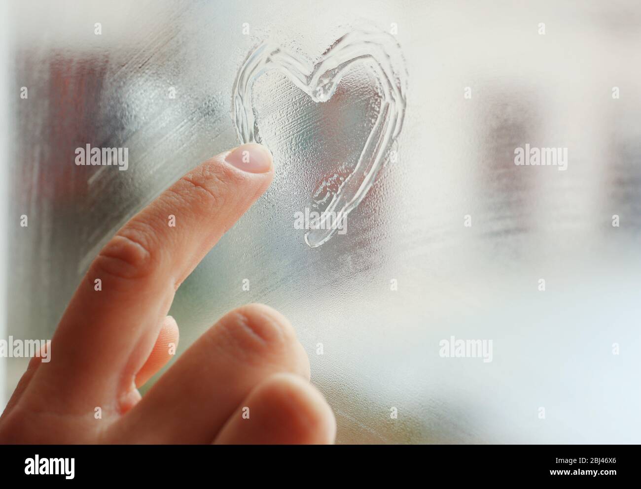 Heart drawn on the fogged glass window Stock Photo - Alamy