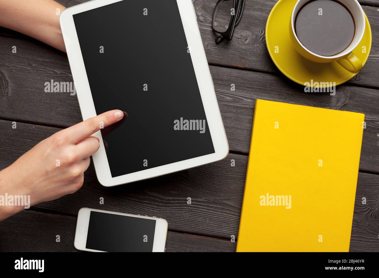 Wood table of business workplace, top view Stock Photo - Alamy