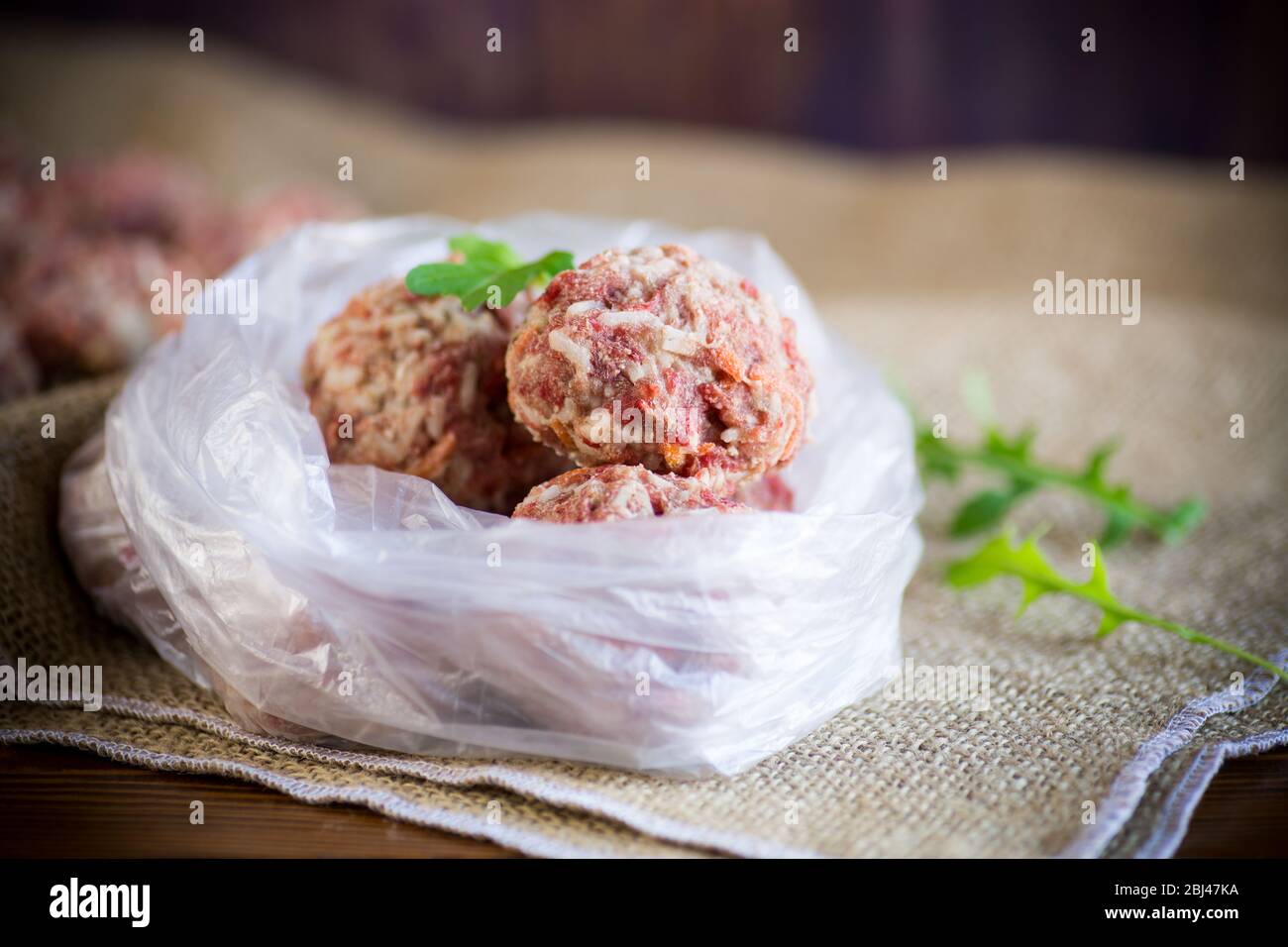Frozen Raw Meatballs From Beef And Pork With Carrots And Rice Stock