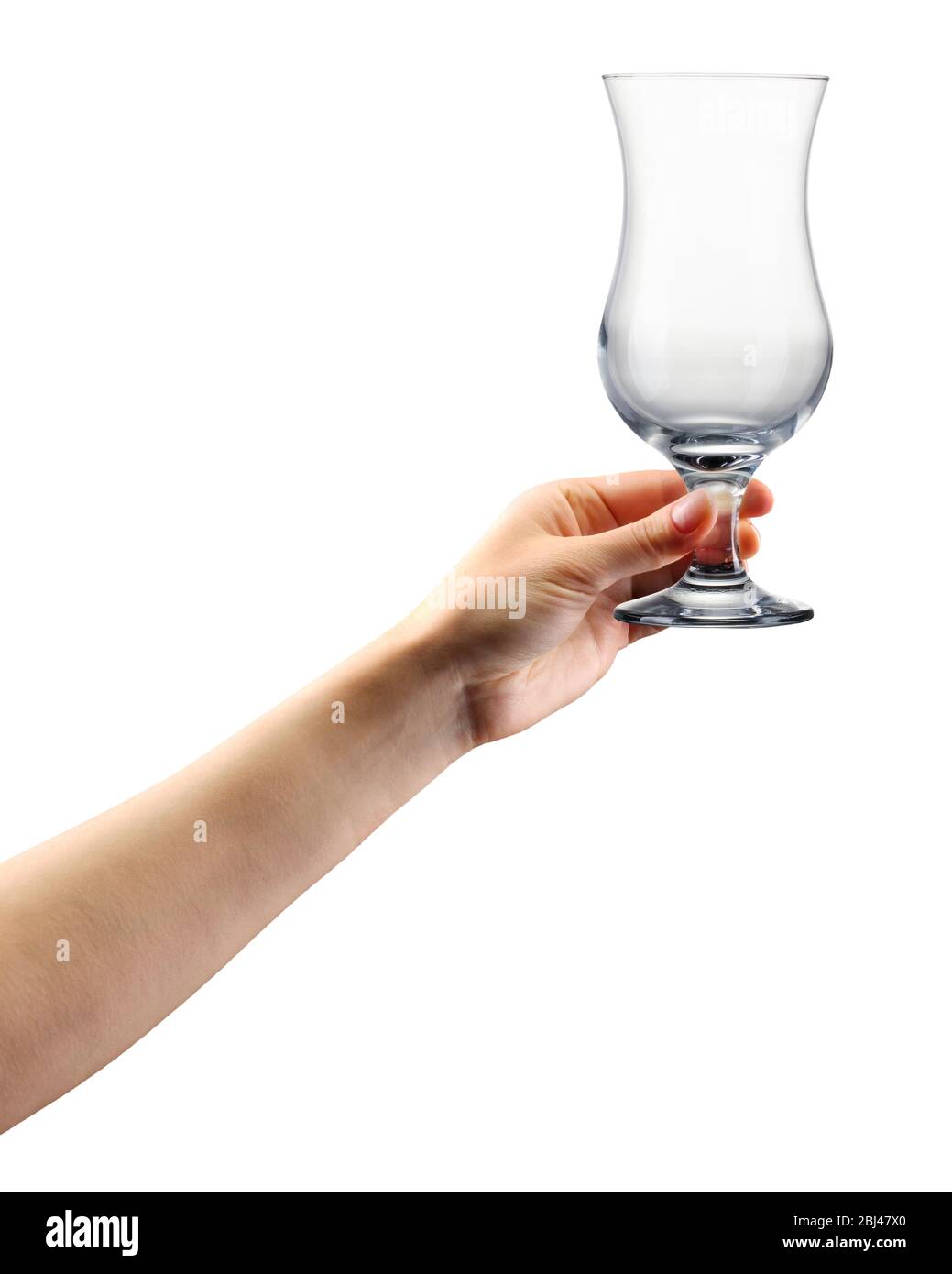 Woman hand holding empty cocktail glass isolated on white Stock Photo ...