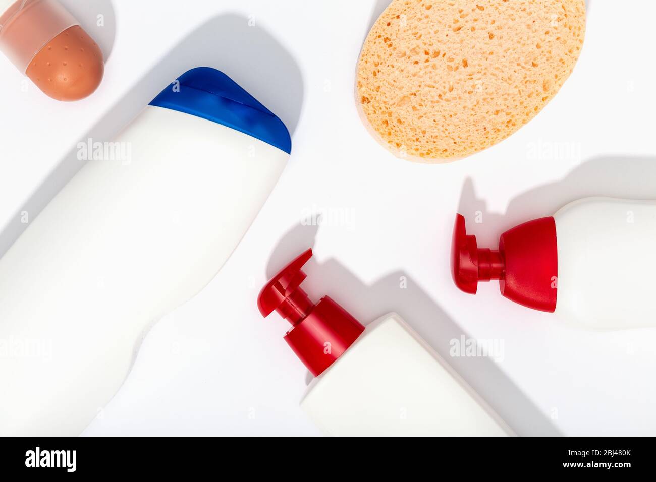 Assorted personal hygiene products on white background. Containers of ...