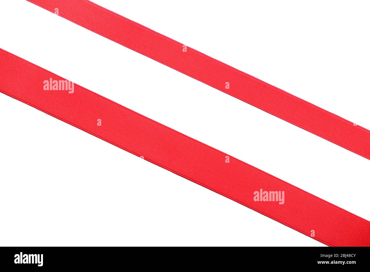 two red diagonal ribbons, isolated on white Stock Photo - Alamy