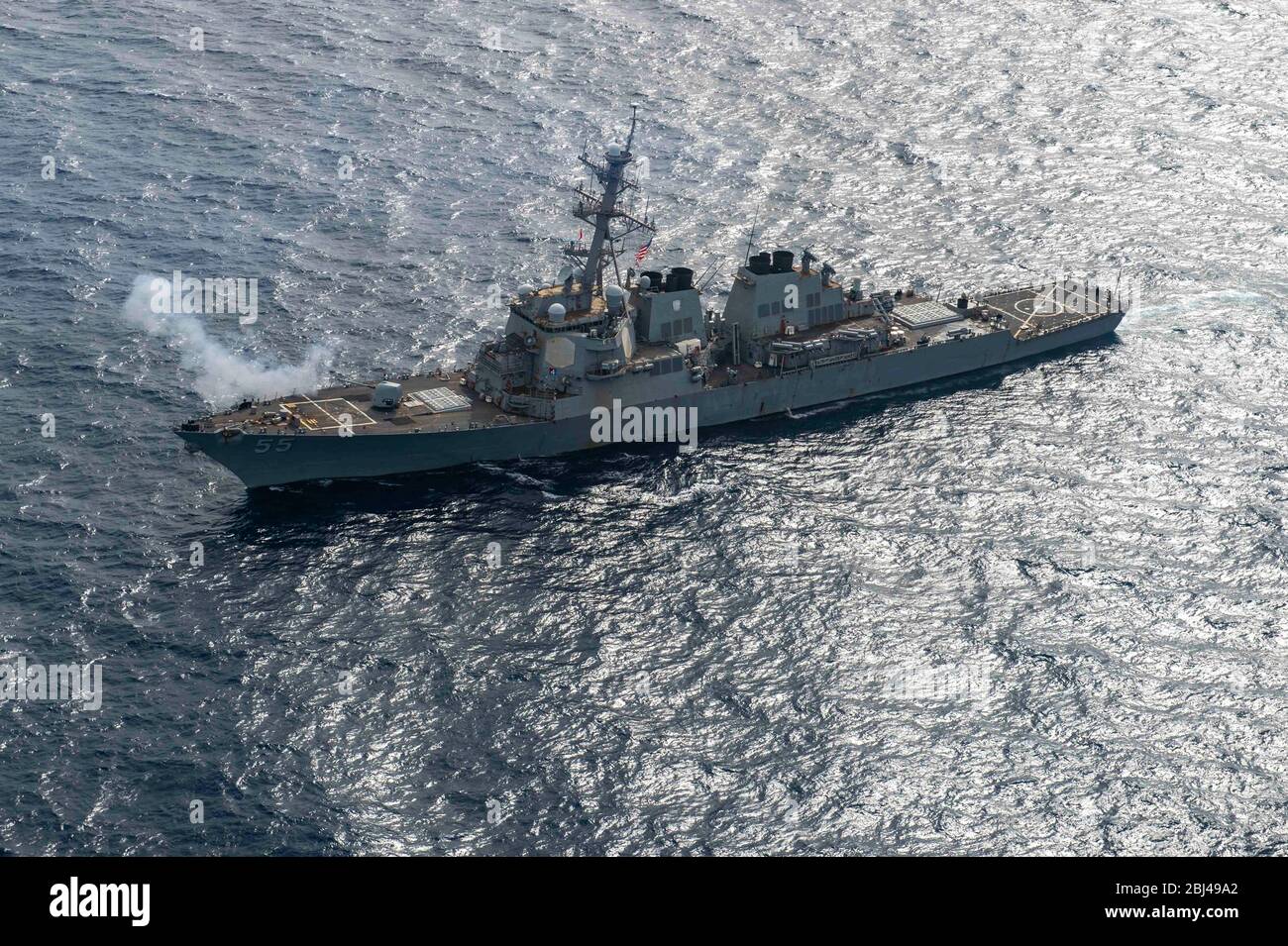 The U.S. Navy guided-missile destroyer USS Stout during a live fire ...