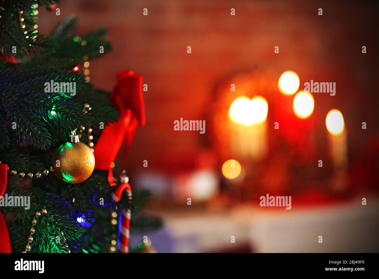 Christmas tree on home interior background Stock Photo - Alamy