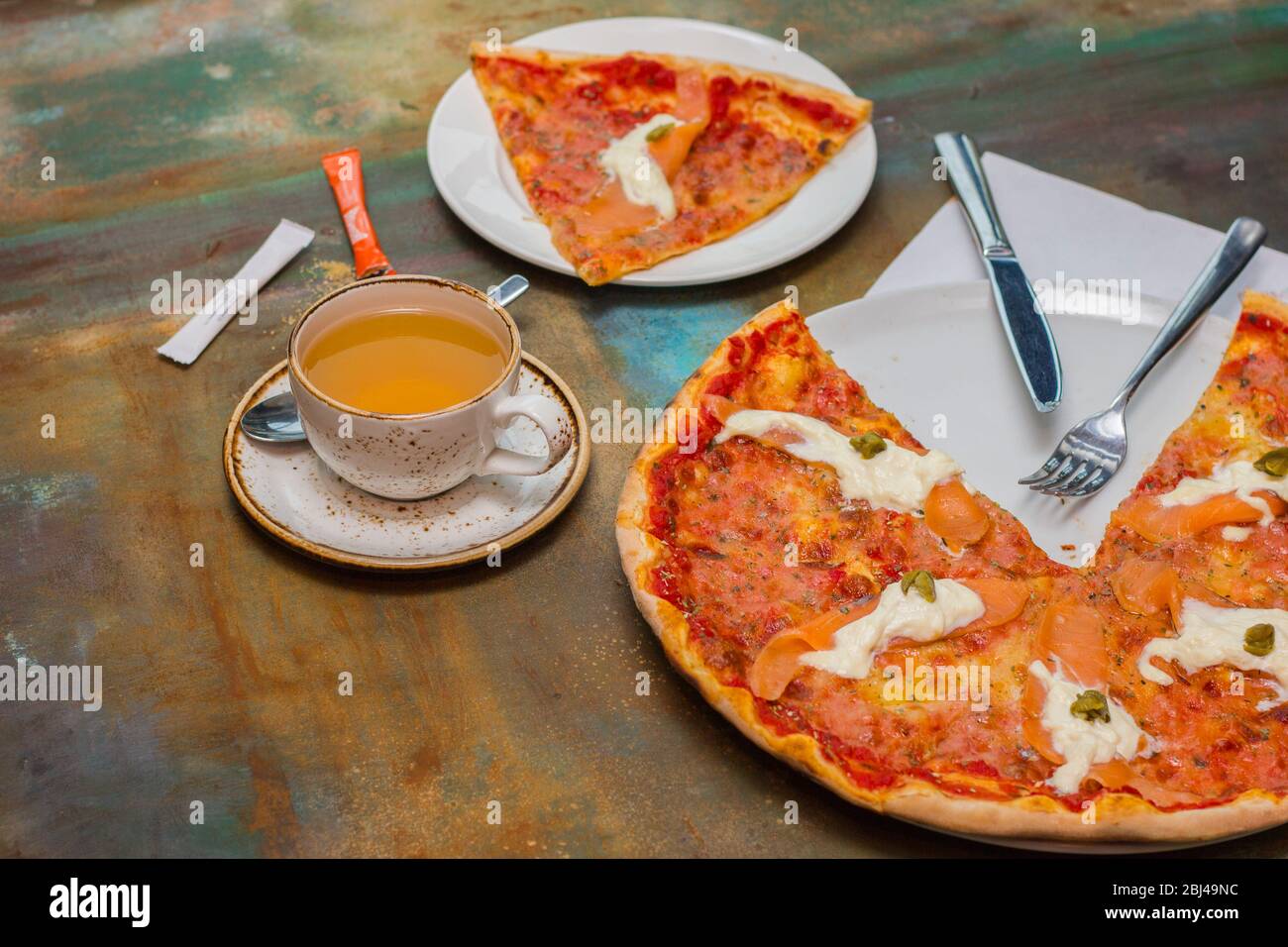 Pizza with red fish and cheese. Seafood Stock Photo - Alamy