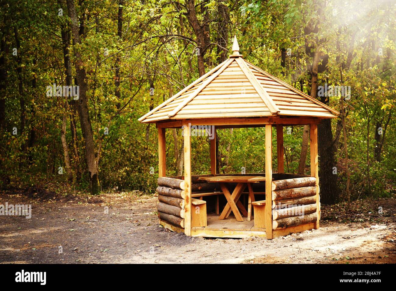Wooden garden house, alcove in the forest Stock Photo - Alamy