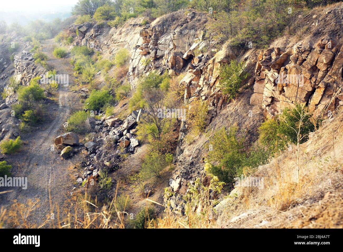 Landscape of an abandoned quarry Stock Photo - Alamy
