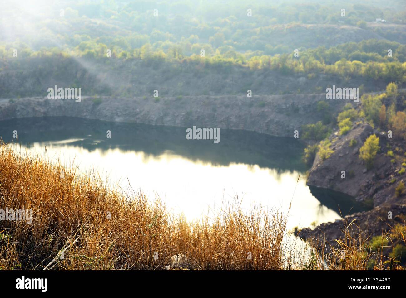 Landscape of an abandoned quarry Stock Photo - Alamy