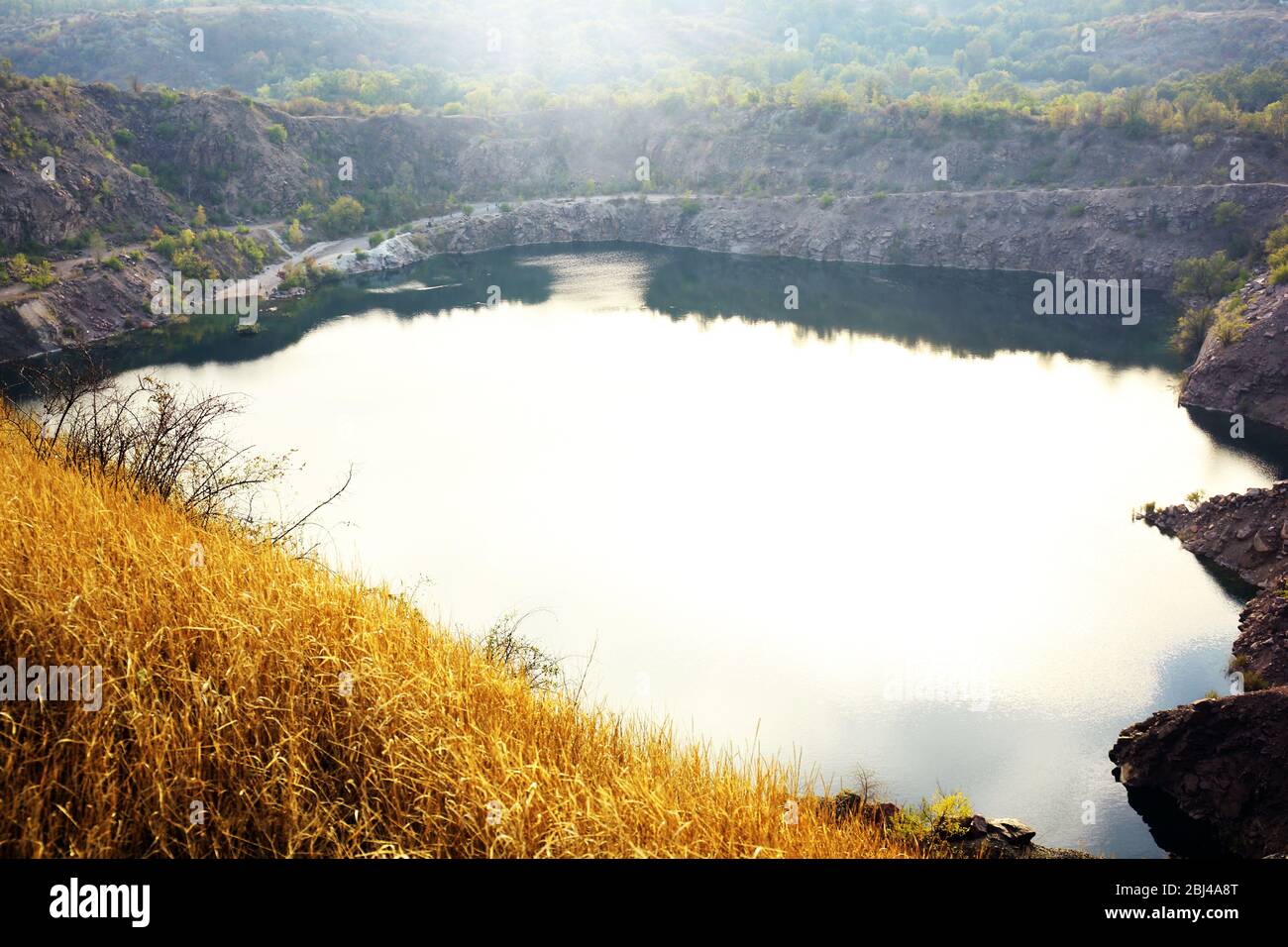 Landscape of an abandoned quarry Stock Photo - Alamy