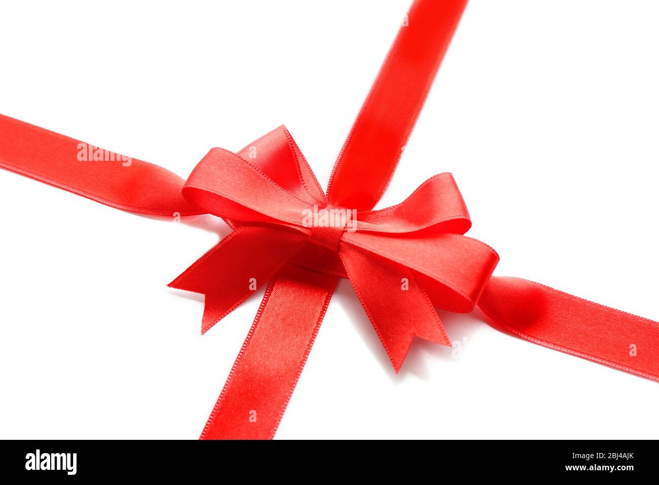 Two ribbons and bow, isolated on white Stock Photo - Alamy