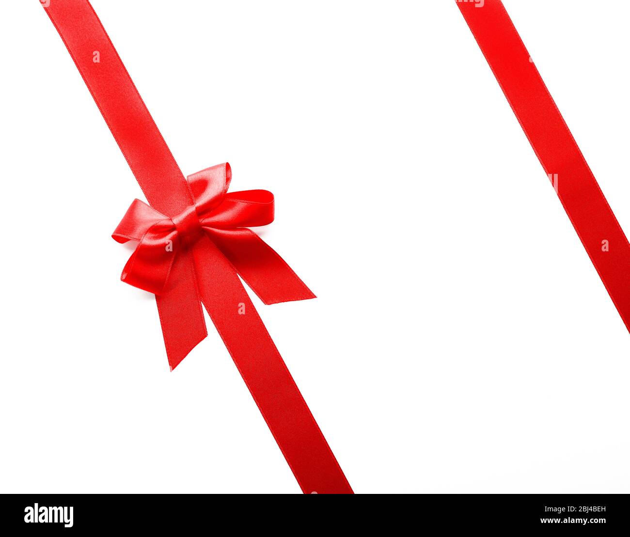 Two ribbons and bow, isolated on white Stock Photo - Alamy