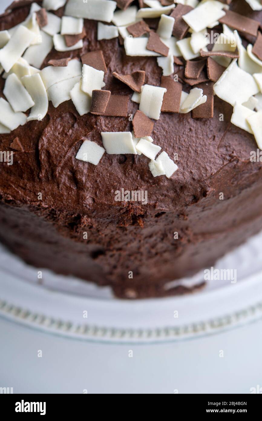 Chocolate cake on a stand Stock Photo - Alamy