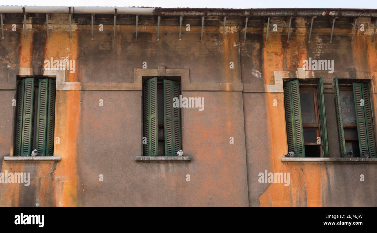 Row of windows of an old house Stock Photo - Alamy