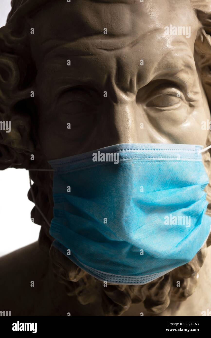 Gypsum Copy of Ancient Statue Homer Wearing Virus Face Mask Stock Photo ...