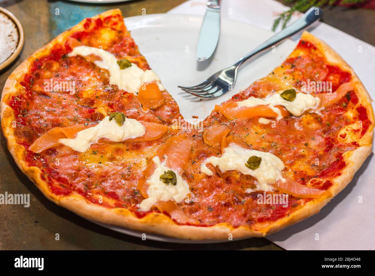 Pizza with red fish and cheese Stock Photo - Alamy
