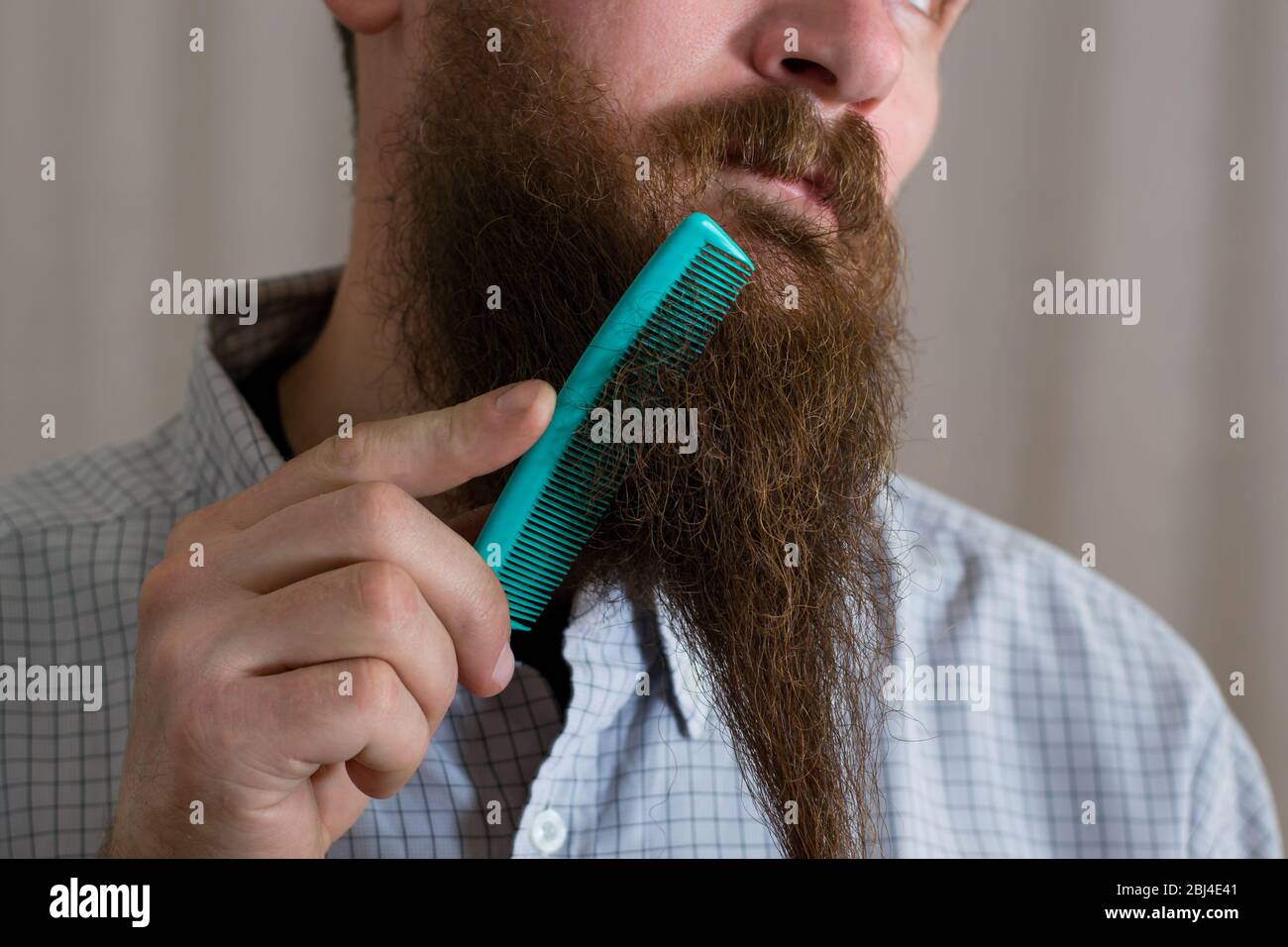 Combs beard hi-res stock photography and images - Alamy