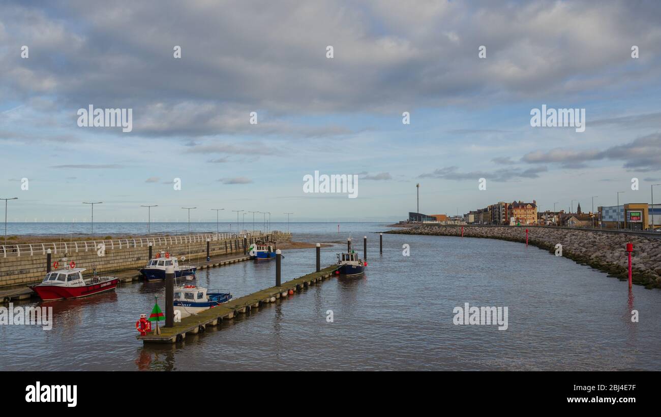 RHYL, UK - JAN 29, 2019: Fishing boats are moored at Rhyl Harbour, with ...