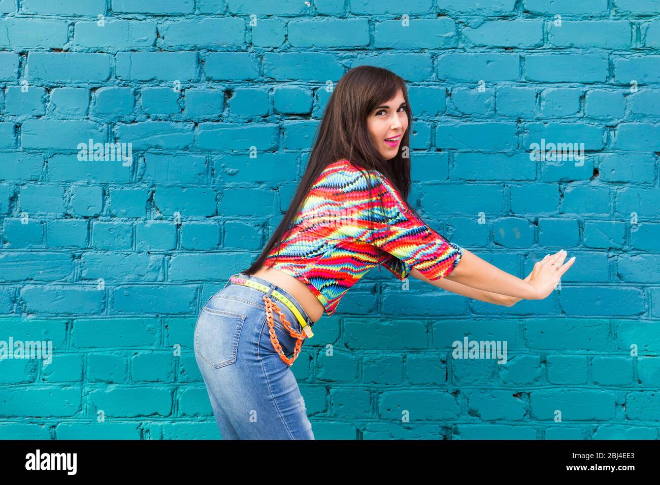 Street shaabi dance and urban dancer concept - Cheerful belly dancer ...