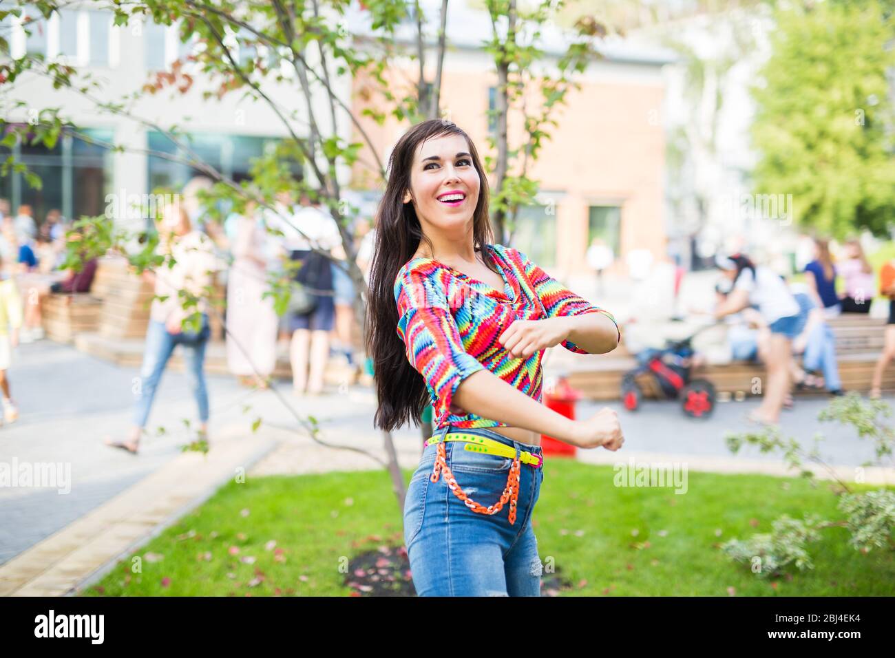 Street shaabi dance and urban dancer concept - Cheerful belly dancer ...
