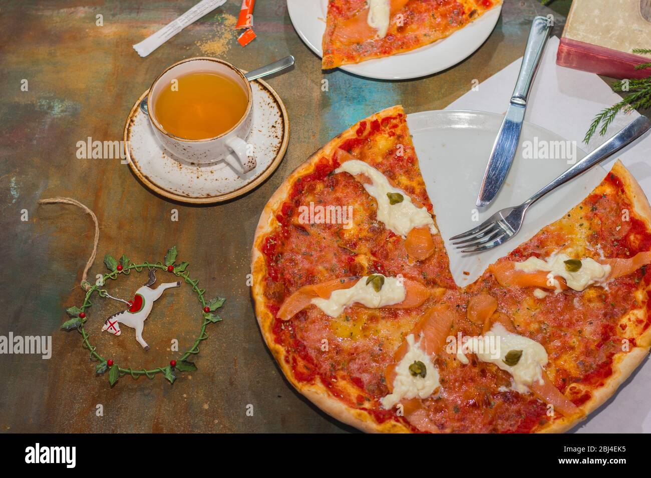 Pizza with red fish and cheese. Seafood Stock Photo - Alamy