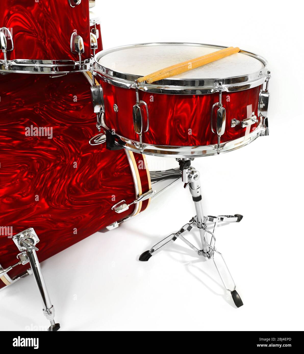 Set of red drums isolated on white background, close up Stock Photo - Alamy
