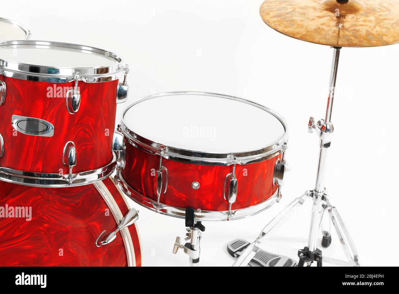 Set of red drums isolated on white background, close up Stock Photo - Alamy