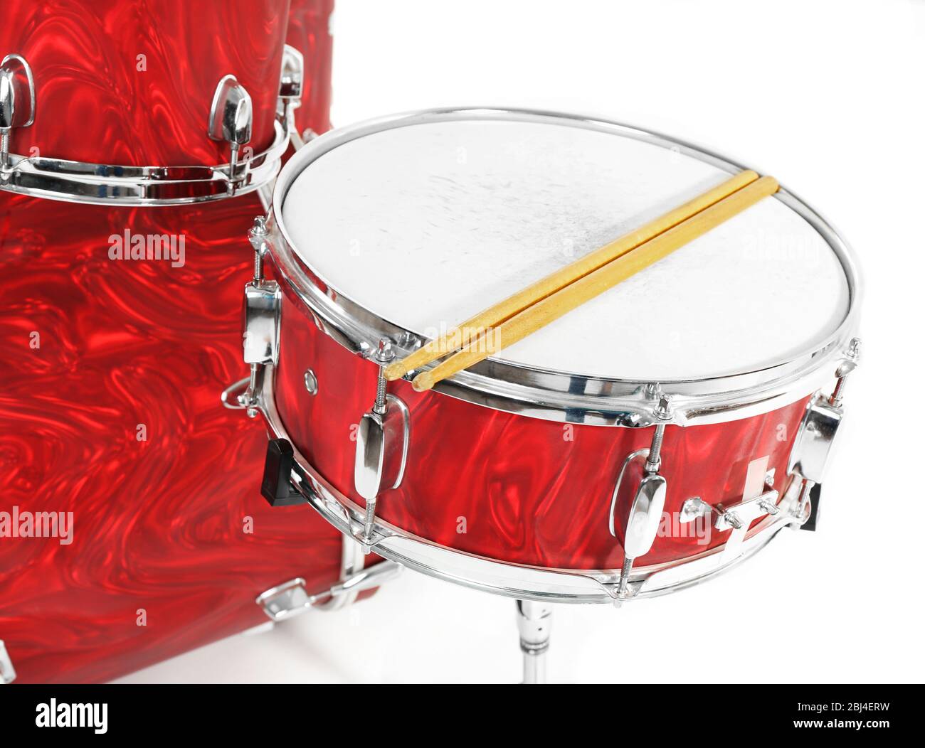 Set of red drums isolated on white background, close up Stock Photo - Alamy