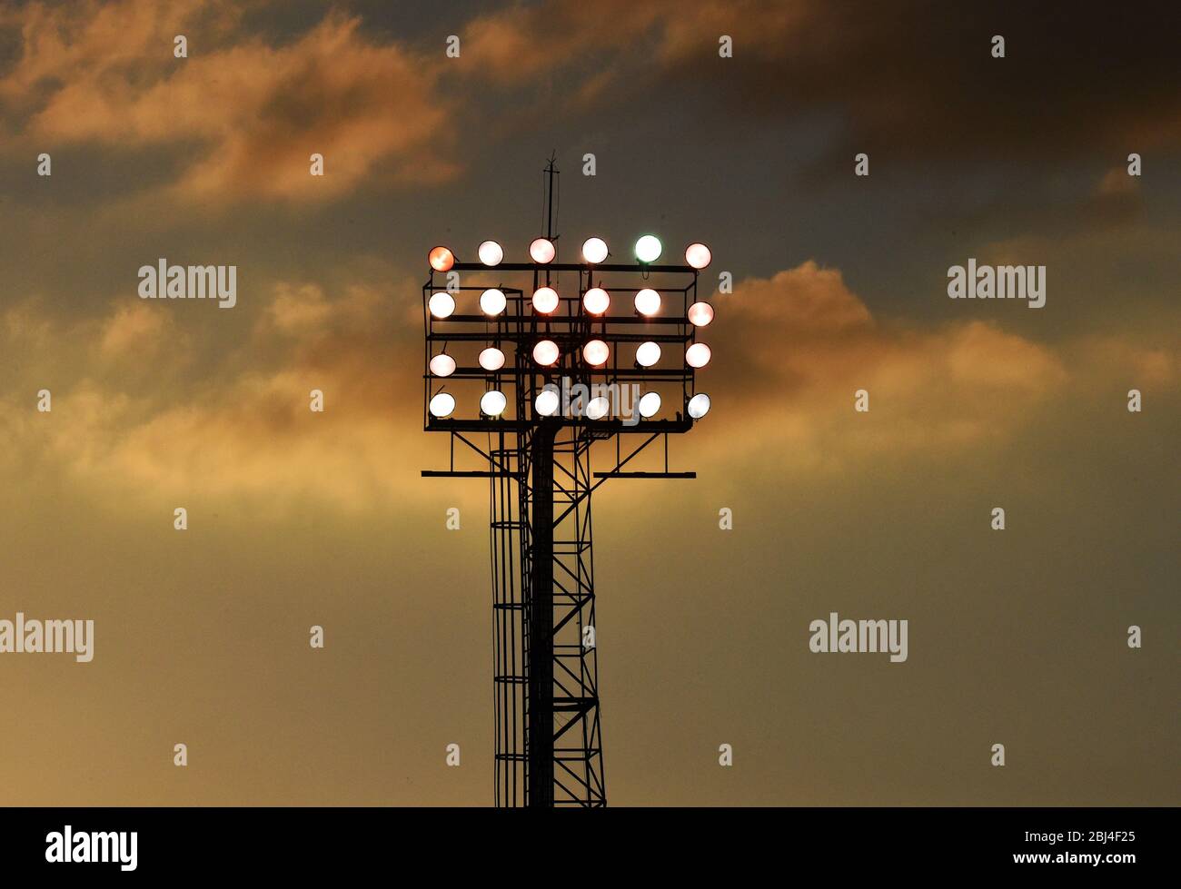 tower of light reflectors in the late afternoon Stock Photo - Alamy