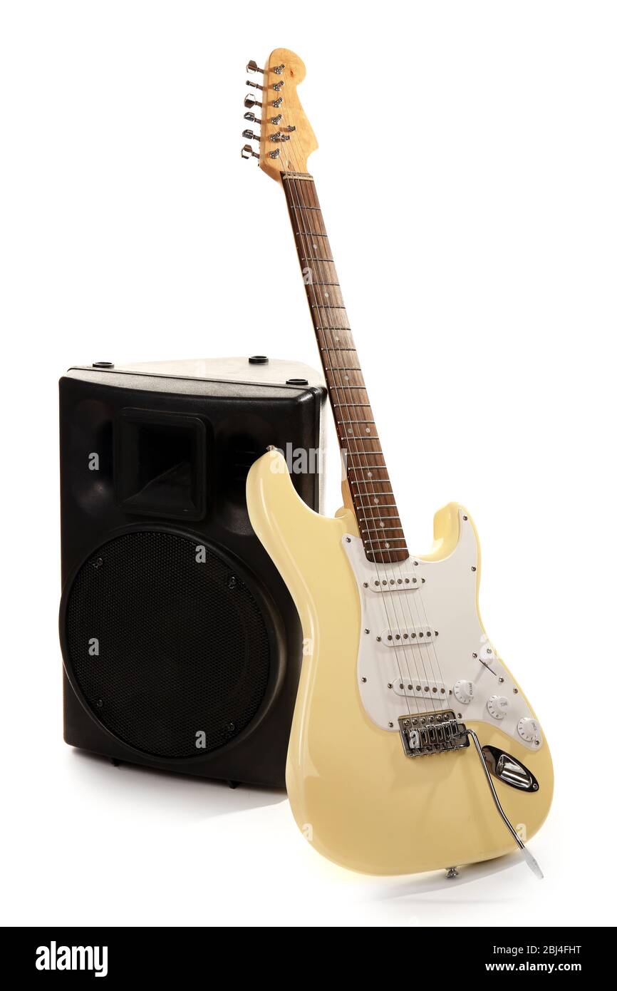 Electric guitar with musical equipment on light background Stock Photo ...