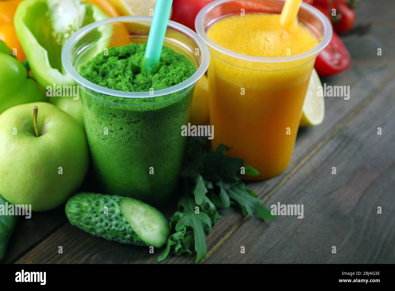 Fresh juice mix fruit, healthy drinks on wooden background Stock Photo ...
