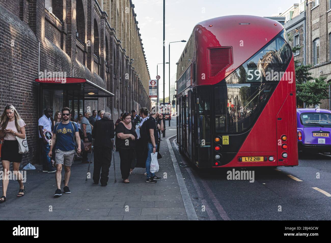 London/UK-26/07/18: people getting off the red double-decker bus at ...