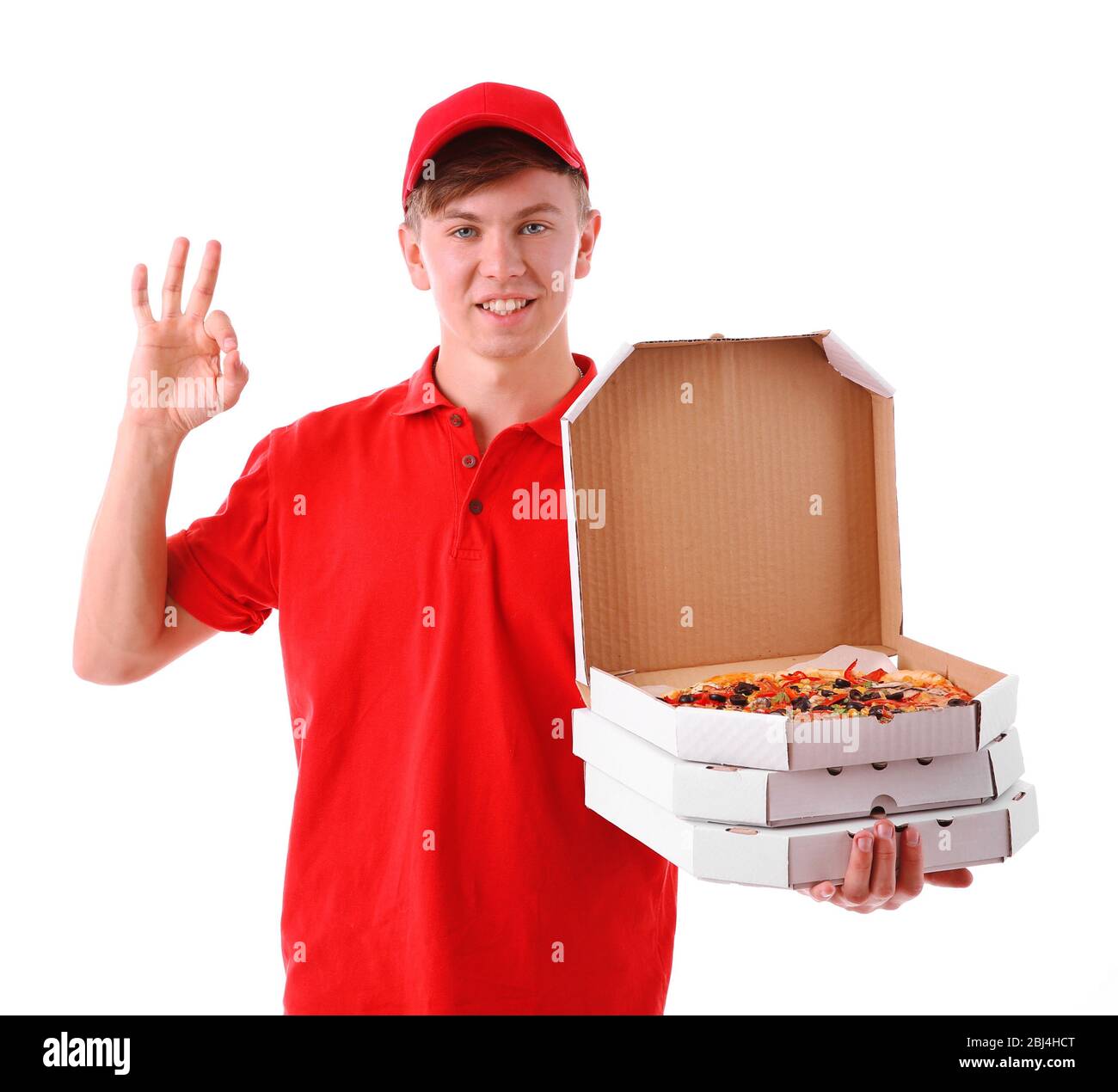 Delivery boy with cardboard pizza boxes isolated on white Stock Photo ...