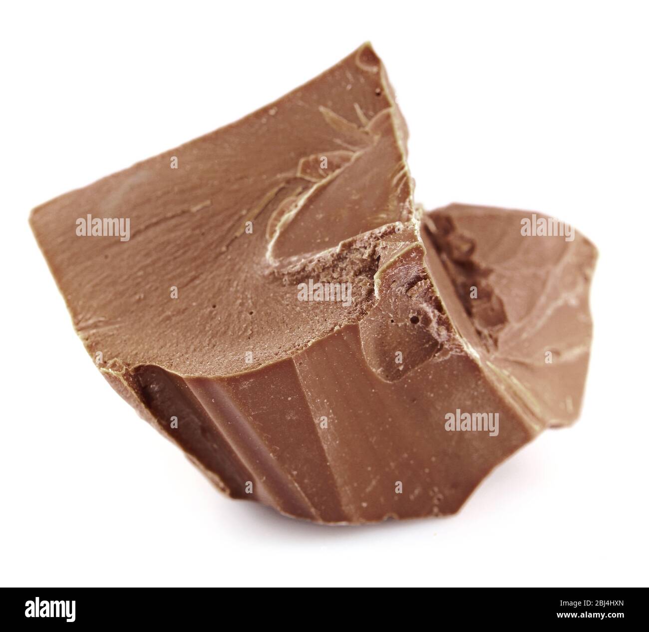 Milk chocolate piece isolated on white Stock Photo - Alamy