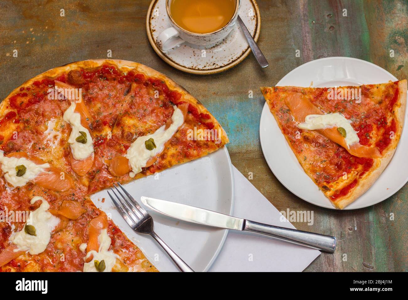 Pizza with red fish and cheese. Seafood Stock Photo - Alamy