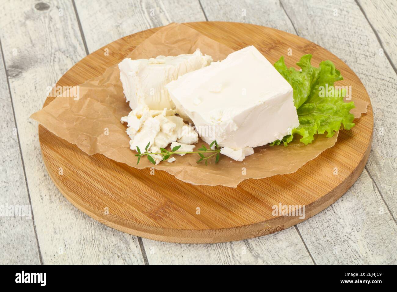 Greek traditional Feta soft cheese in the plate Stock Photo - Alamy