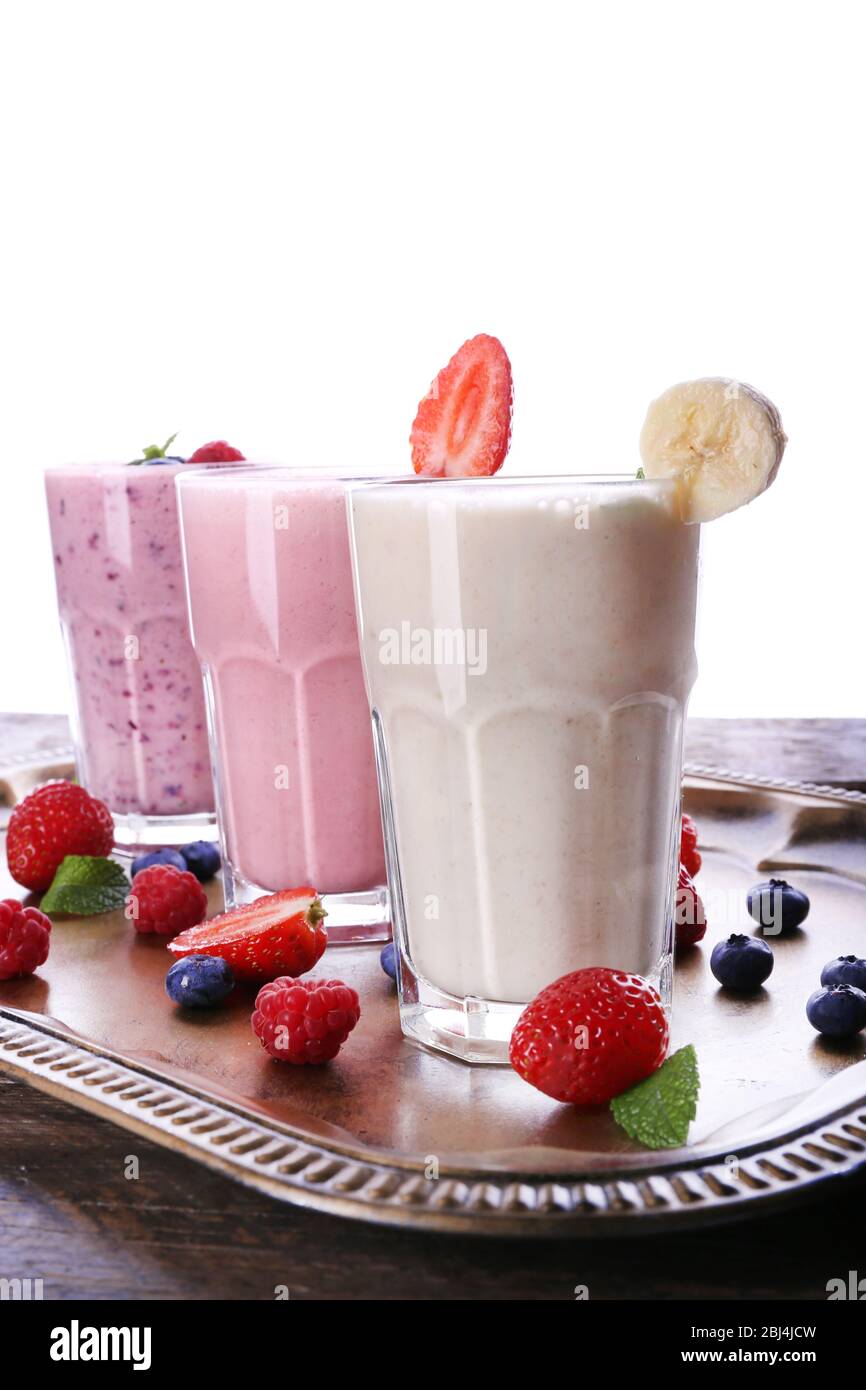 Milk shakes on white background Stock Photo - Alamy