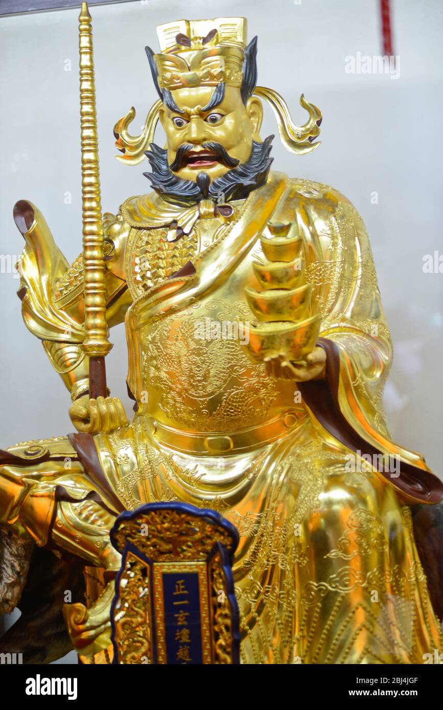Golden statue in the City God Temple of Shanghai. China Stock Photo - Alamy