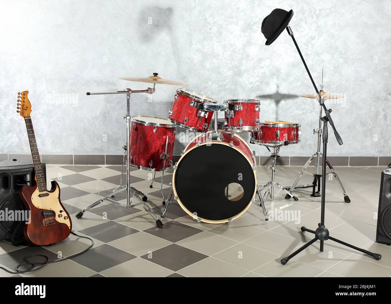 Drum set on brick wall background Stock Photo - Alamy