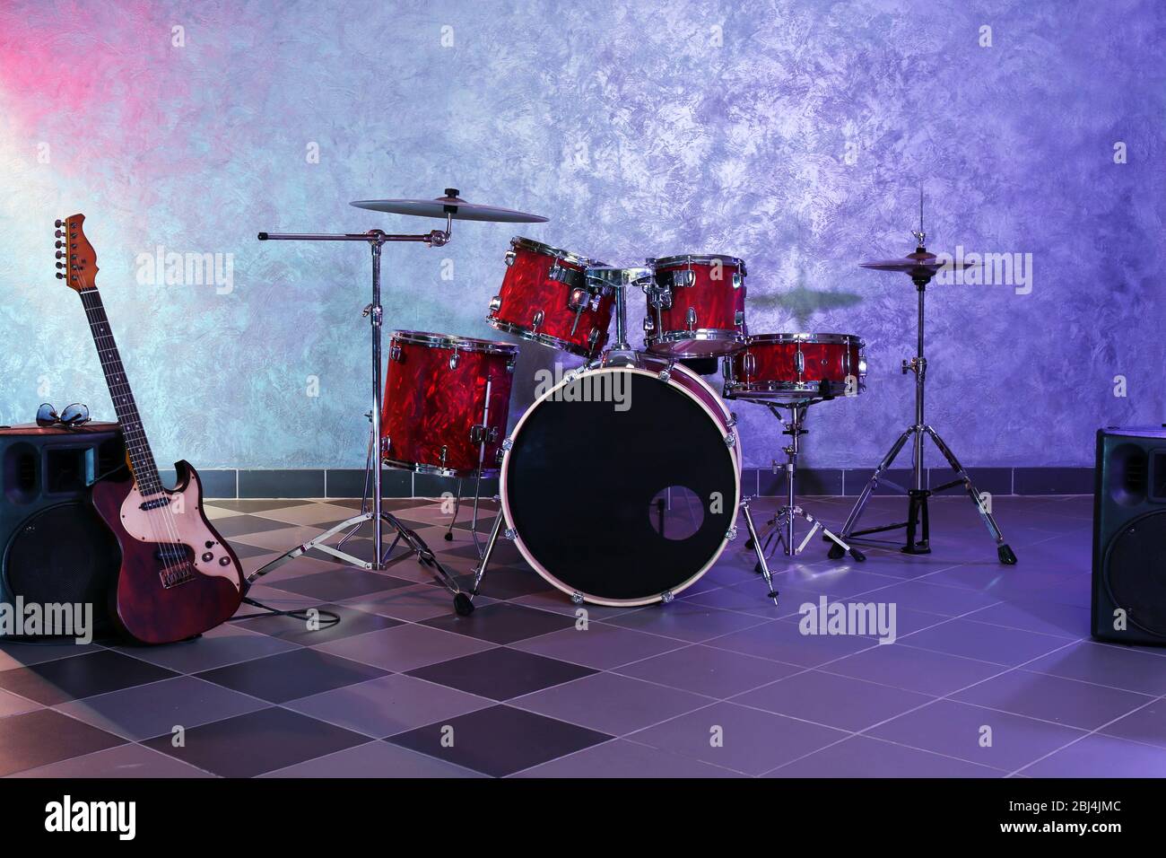 Drum set on brick wall background Stock Photo - Alamy