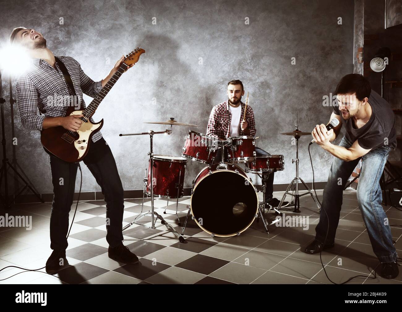 Musicians in the studio Stock Photo - Alamy