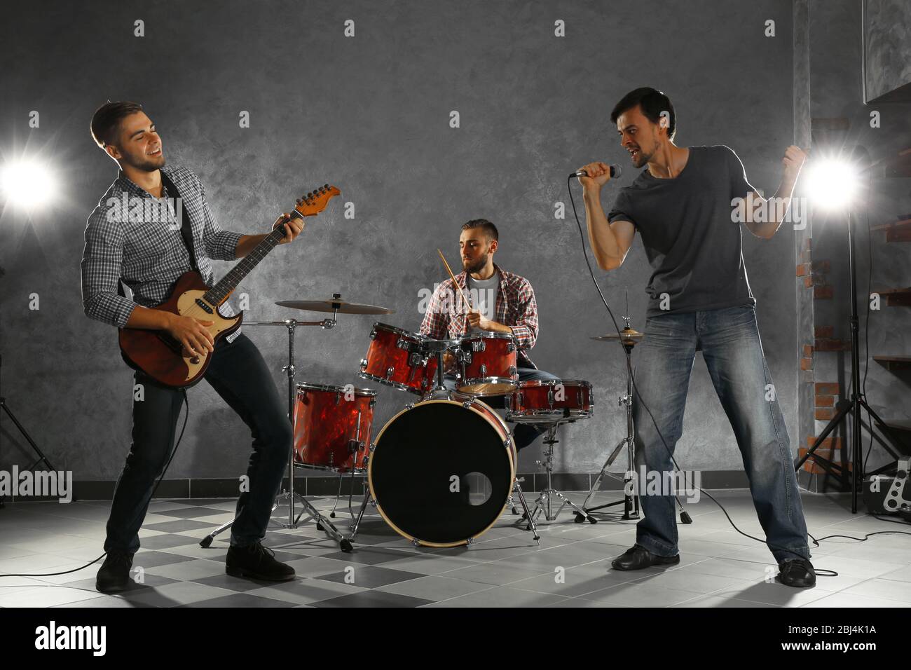 Group musicians playing songs hi-res stock photography and images - Alamy