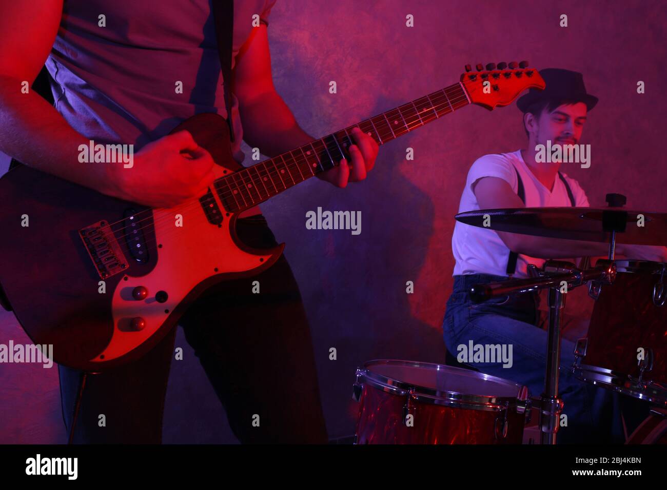 Musicians playing musical instruments in a studio Stock Photo - Alamy