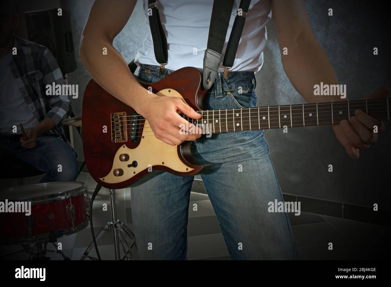 Paying guitar hi-res stock photography and images - Alamy