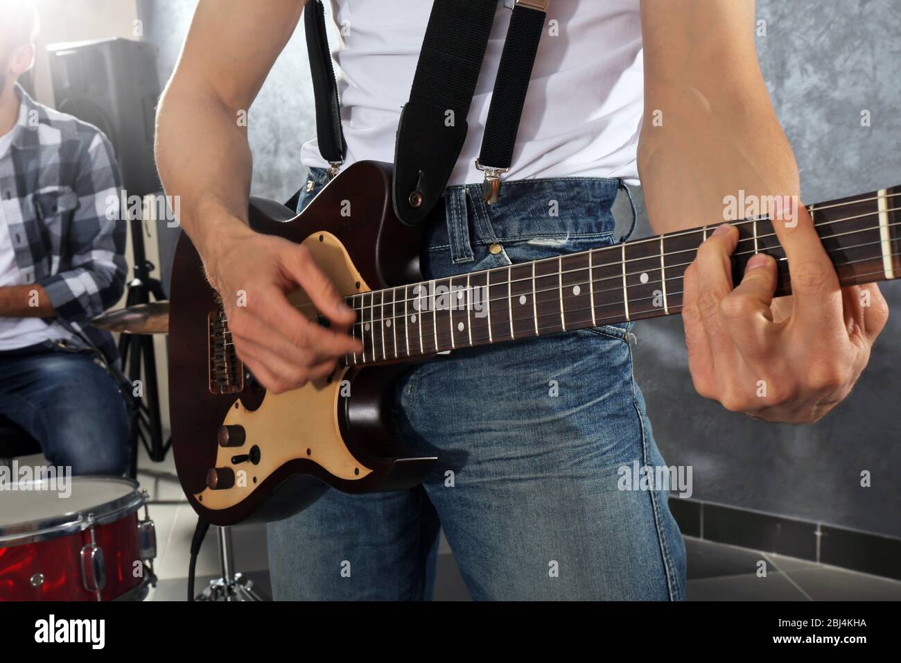 Paying guitar hi-res stock photography and images - Alamy