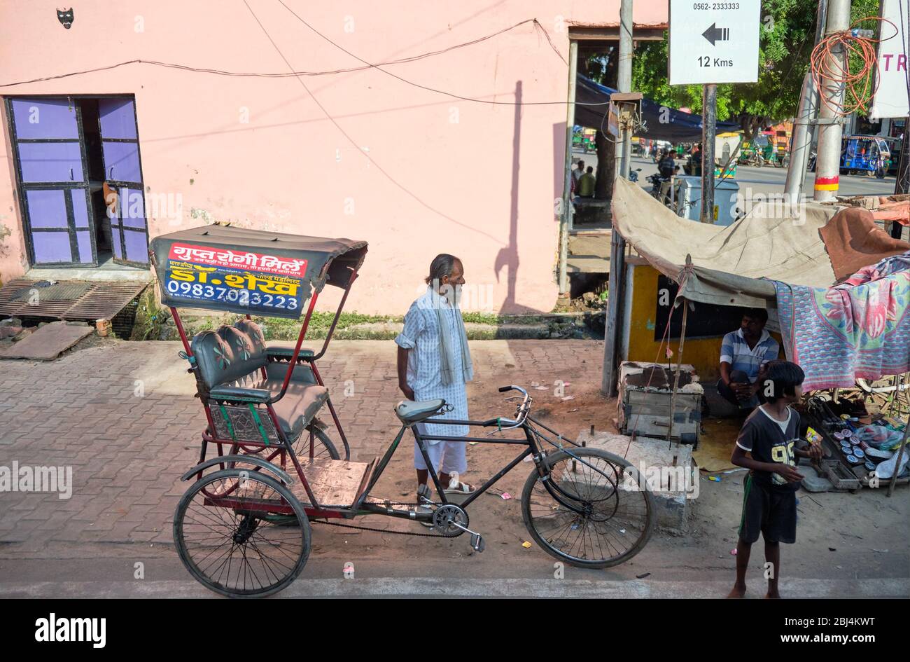 Agra, Uttar Pradesh / India - October 5, 2019: Poor old rickshaw driver ...