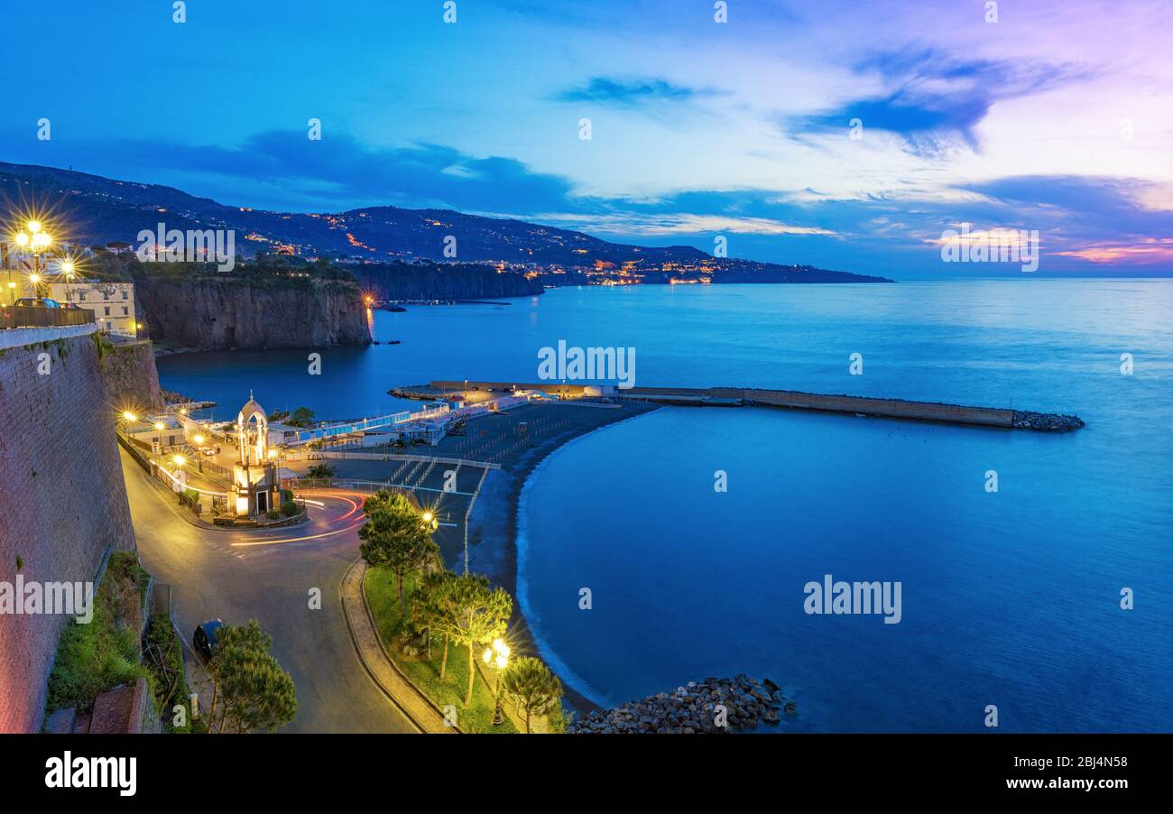 Sunset view of rocky coastline Sorrento and Gulf of Naples - popular ...