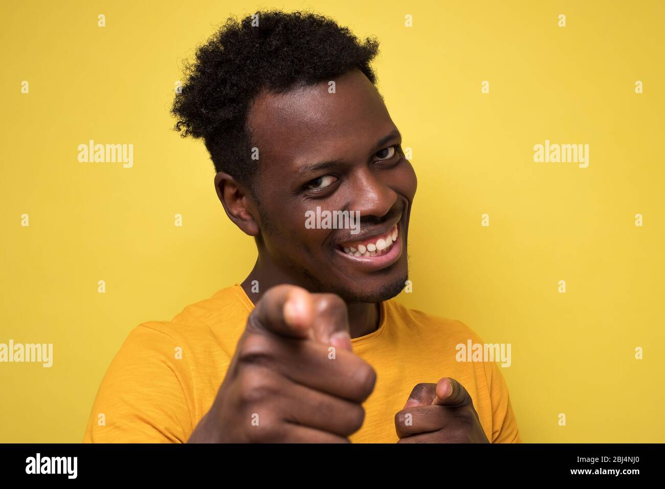 Cheerful black man making hi-res stock photography and images - Alamy