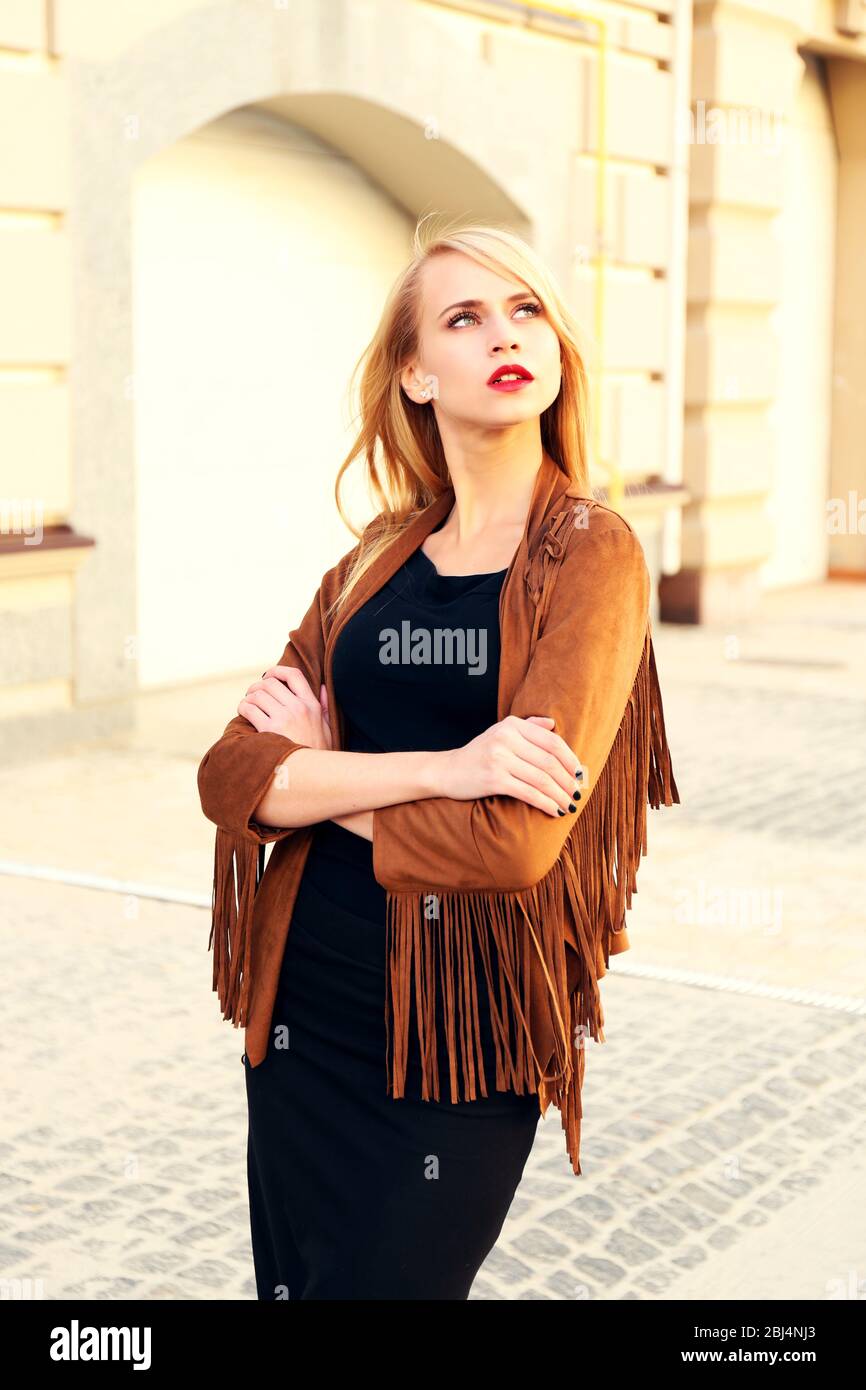 Elegant lady in the street of old city Stock Photo - Alamy